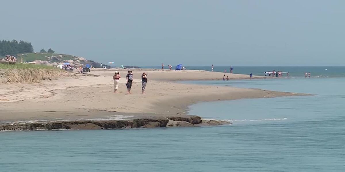 ‘I can’t get out’: Woman walking on popular beach gets trapped in ... ‘I can’t get out’: Woman walking on popular beach gets trapped in ...
